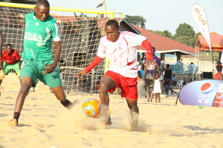 Real Galacticos Player in Red and white dribbles passed a Zaba ...