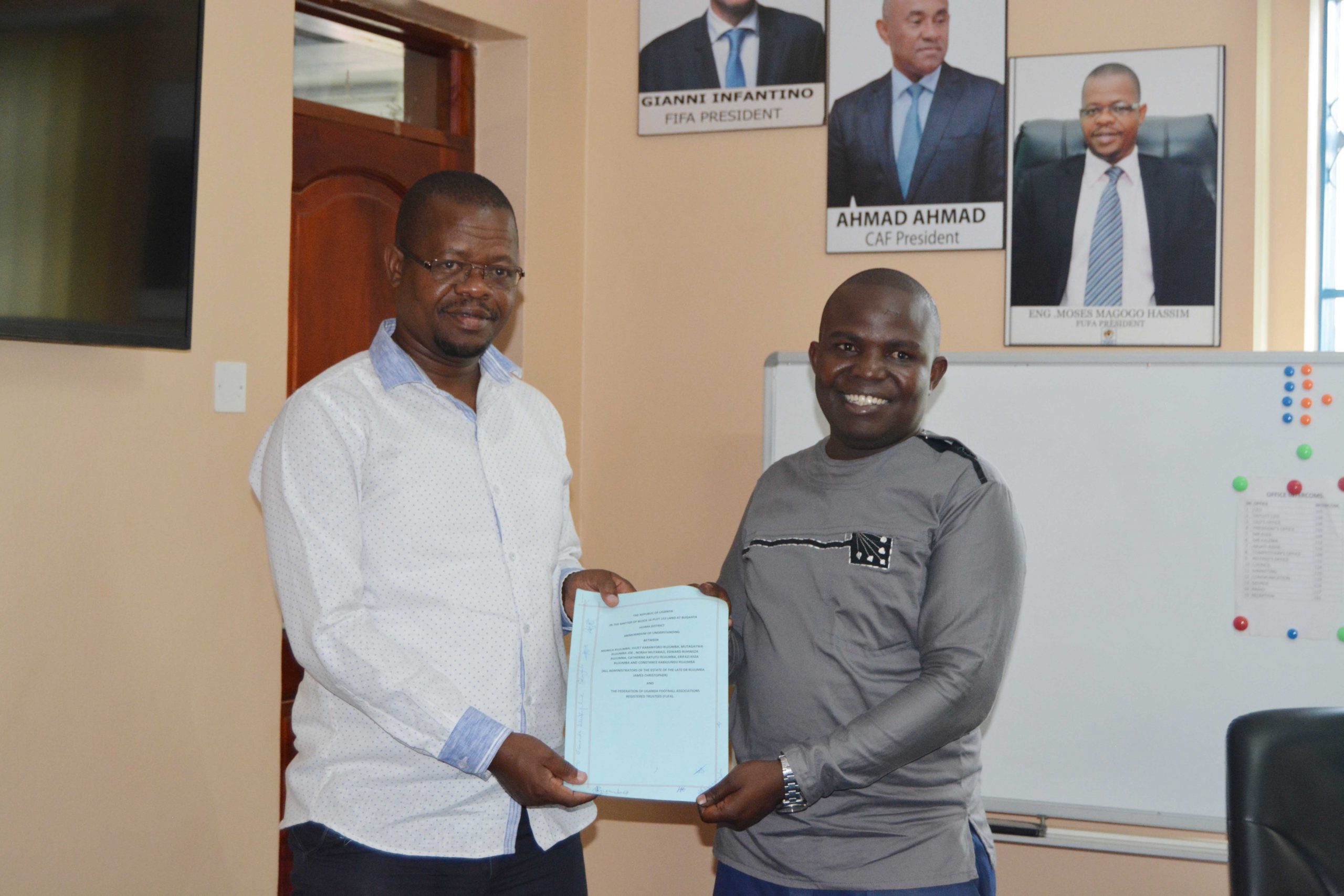 FUFA signs MOU with Rujumba family to construct stadium in Hoima - FUFA ...