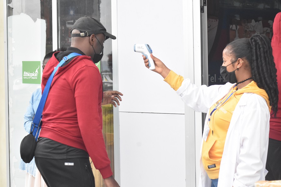 Team manager Geofrey Massa being tested his temperature - FUFA ...